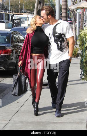German millionaires Maria and Bastian Yotta share a kiss out in Beverly ...