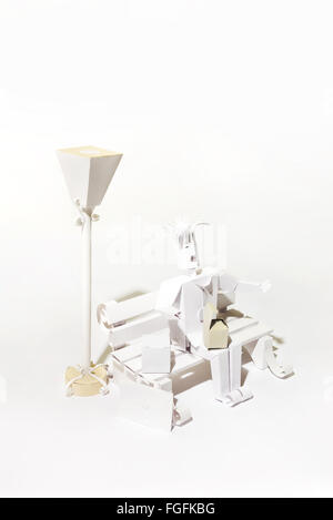 Man shape cut out of paper on canvas sack Stock Photo - Alamy