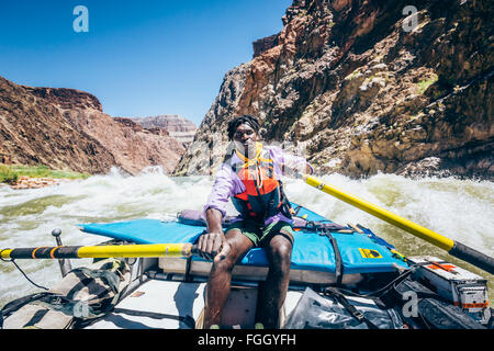 A man rows a raft in a rapid on the Colorado River Stock Photo - Alamy