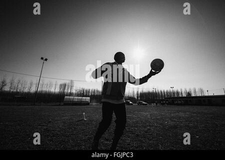 Italy, Parona, refugee center, football team Stock Photo - Alamy