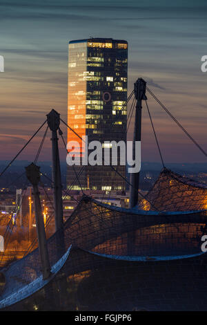 Hochhaus Uptown München, O2 Tower in the evening light, Olympic Stadium ...