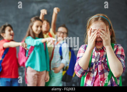 A school girl crying Stock Photo - Alamy
