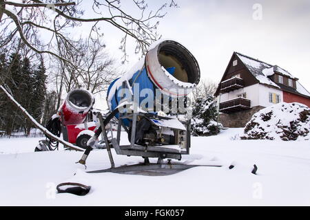 Snow making machine on piste at ski resort in snowy country Stock Photo ...
