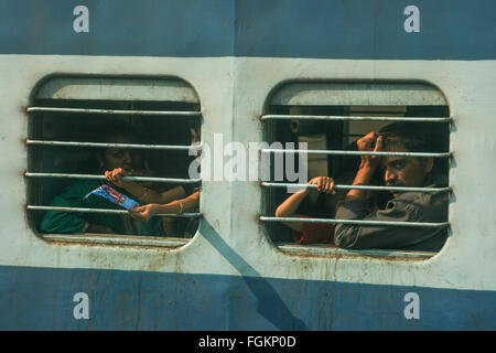 People looking through open train window, Sri Lanka Stock Photo - Alamy