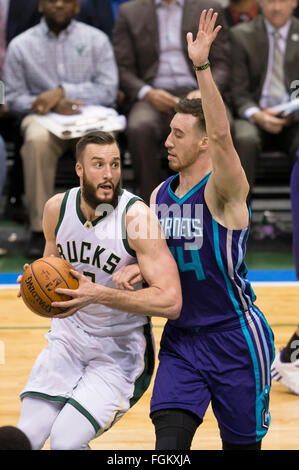 Charlotte Hornets' Frank Kaminsky III and Milwaukee Bucks' Tyler Ennis ...