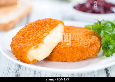 Fresh made Fried Camembert (selective focus) on wooden background Stock ...