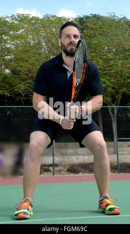 Male tennis player practice in tennis court in Dubai Stock Photo - Alamy