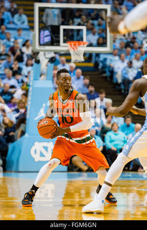 Miami guard Sheldon McClellan (10) drives against Utah guard Lorenzo ...