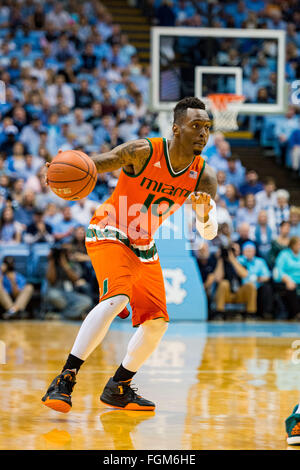 Miami guard Sheldon McClellan (10) drives against Utah guard Lorenzo ...