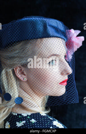 Beautiful woman with blue eyes wearing sportswear using dumbbells angry ...