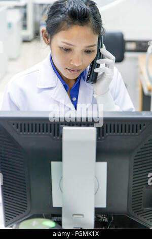 It technician, phone call and black woman thinking and confused in ...