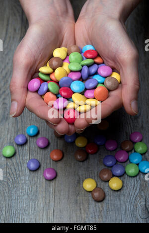 Handful of sugar coated candy orange slices Stock Photo - Alamy