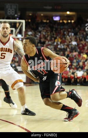 Utah guard Brandon Taylor (11) passes the ball as Colorado guard Jaron ...