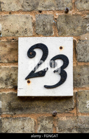 House number "23" attached to a wall Stock Photo - Alamy