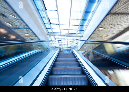 Abstract interior view of escalators & commercial jet at Ministro ...