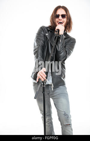 young handsome man with sunglasses singing Stock Photo - Alamy