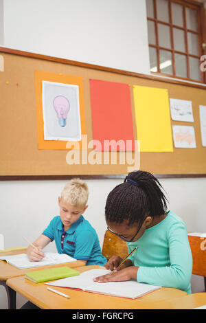 Busy students working on class work Stock Photo - Alamy