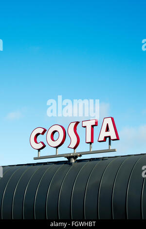 Costa coffee signs and shop on motorway service station and car park ...