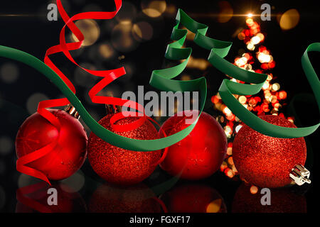 Composite image of ribbon in shape of christmas tree Stock Photo - Alamy