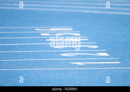 Numbers at finish line of 60 meters running field Stock Photo - Alamy