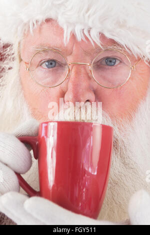 Santa Claus drinking hot chocolate on Christmas eve Stock Photo - Alamy