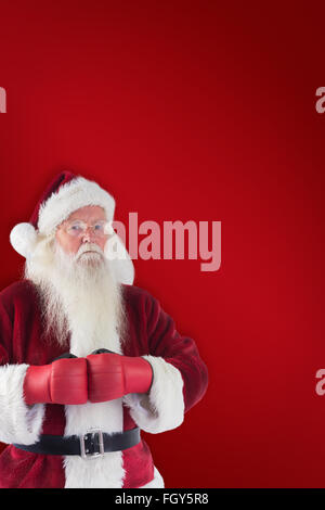 Santa Claus wears boxing gloves Stock Photo - Alamy