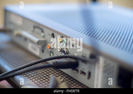 The rear of a Verizon Fios set top box, showing the various ports and ...