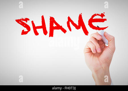 Shame against businessmans hand writing with marker Stock Photo - Alamy