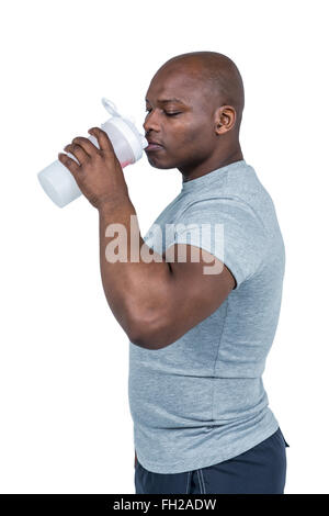 Fit man with protein powder Stock Photo - Alamy