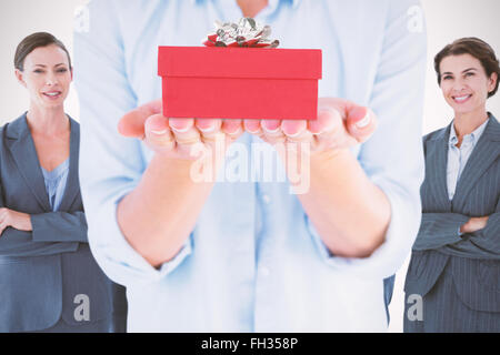 Composite image of womans hands presenting Stock Photo - Alamy