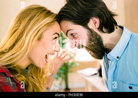 Creative team shouting at each other Stock Photo - Alamy