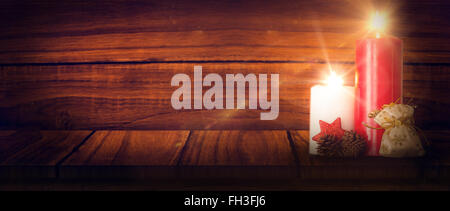Composite image of christmas candles Stock Photo - Alamy