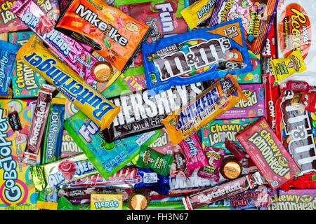 Colourful assorted childrens retro american sweets and candy empty ...