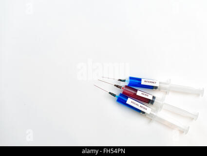Modern addictions: Internet, News and Social Media Stock Photo - Alamy
