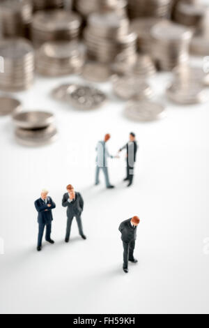 A selective focus shot of a mini toy stage with little figures ...