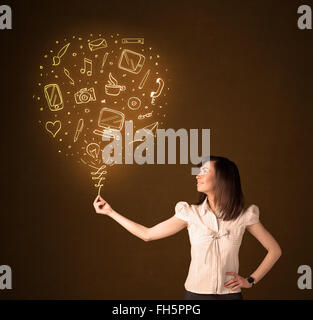 Woman holding social media balloon Stock Photo - Alamy