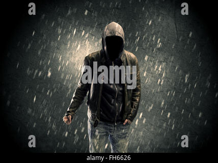 Unknown suspect standing in the dark Stock Photo - Alamy