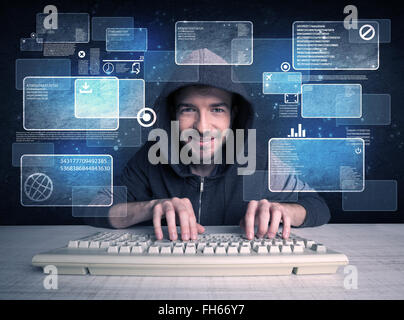 Nerd with glasses hacking websites Stock Photo - Alamy
