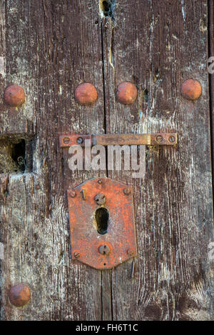 Keyhole on a wooden door Stock Photo - Alamy
