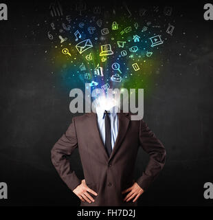Business man with glowing media icons exploding head Stock Photo - Alamy