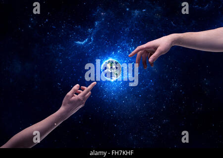 Hands in space touching planet earth Stock Photo - Alamy
