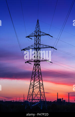 high voltage post in twilight time Stock Photo - Alamy