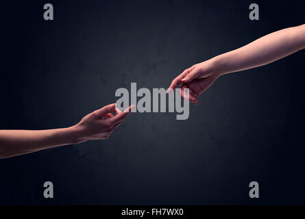 Hand about to touch another one Stock Photo - Alamy
