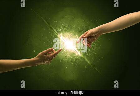 Touching arms lighting spark at fingertip Stock Photo - Alamy