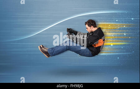 Young man driving in imaginary fast car with blurred lines Stock Photo ...
