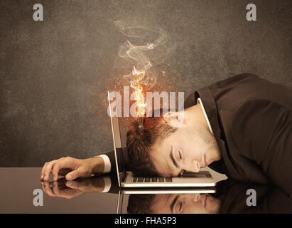 Sad business person's head catching fire Stock Photo - Alamy