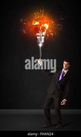 man hold glow lamp in hand Stock Photo - Alamy