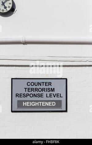Security alert sign Counter Terrorism Response Level sign on a wall ...