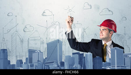 Young worker drawing a city sight Stock Photo - Alamy