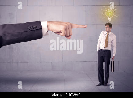 Boss blaming sales person with an idea Stock Photo - Alamy